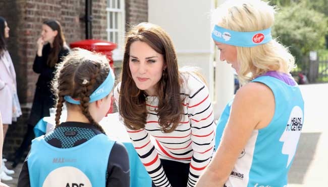 Senyum Manis Kate Middleton saat Bertemu Pelari Heads Together | tempo.co